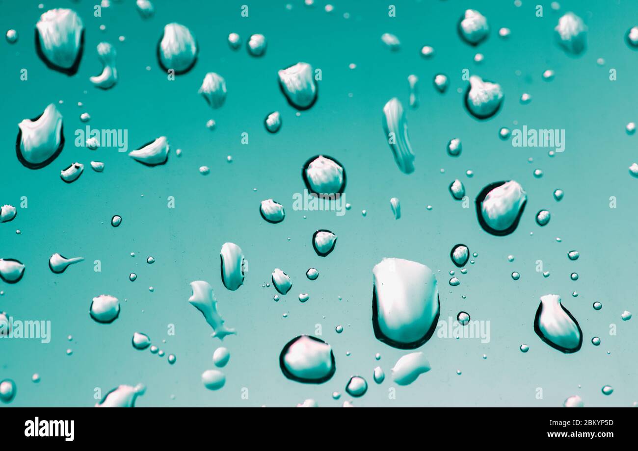 Turquoise, blue water drops background. Water drops on the glass ...