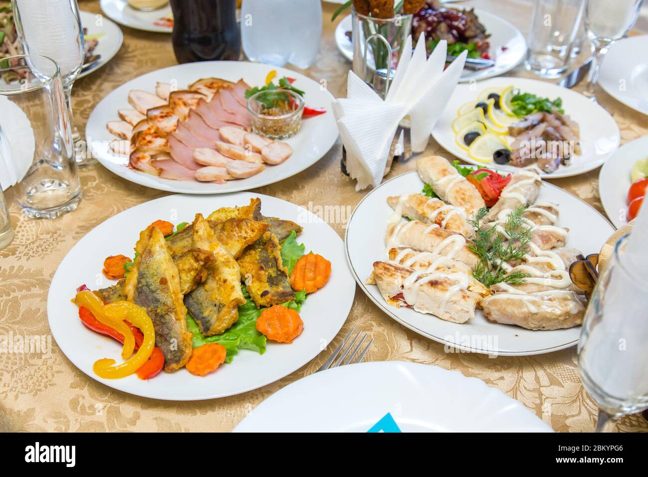 Dishes on a served banquet table in a restaurant Stock Photo - Alamy