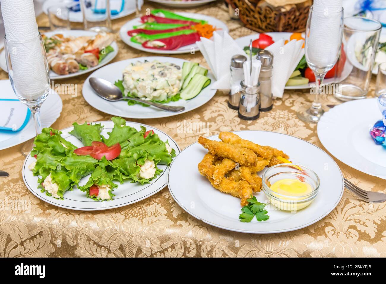 Dishes on a served banquet table in restaurant Stock Photo - Alamy