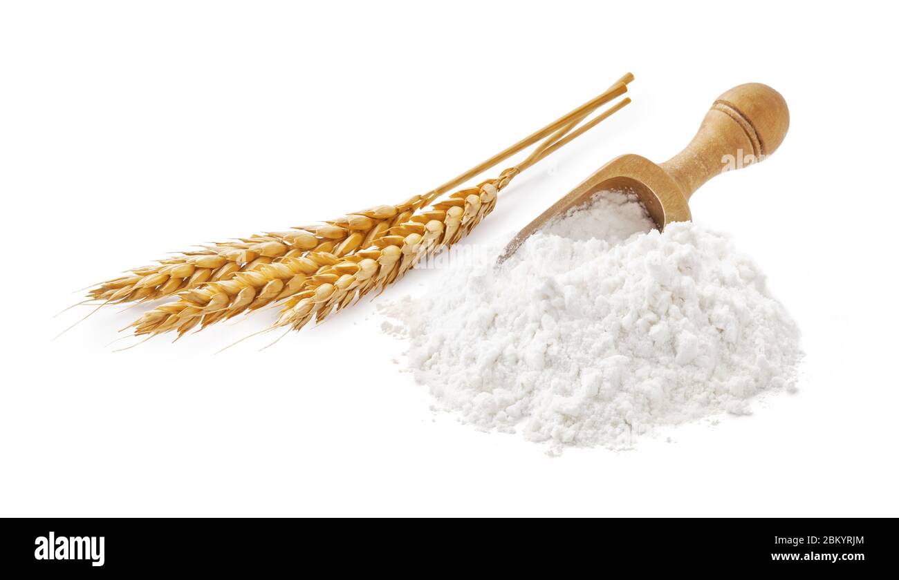 Wheat flour with spikelets and wooden scoop isolated on white Stock ...