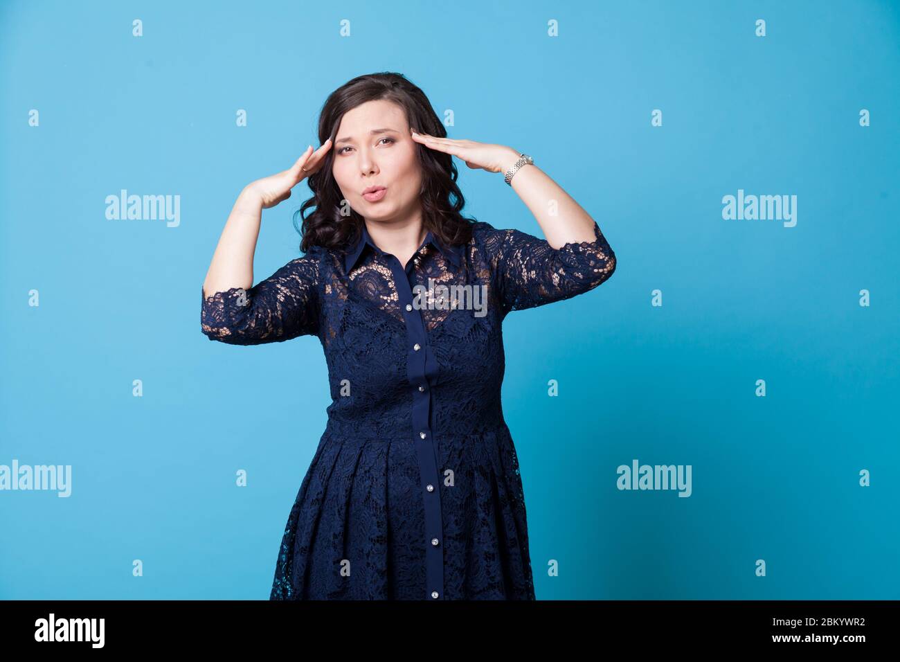 Portrait of a beautiful Asian woman shows a sick head Stock Photo - Alamy