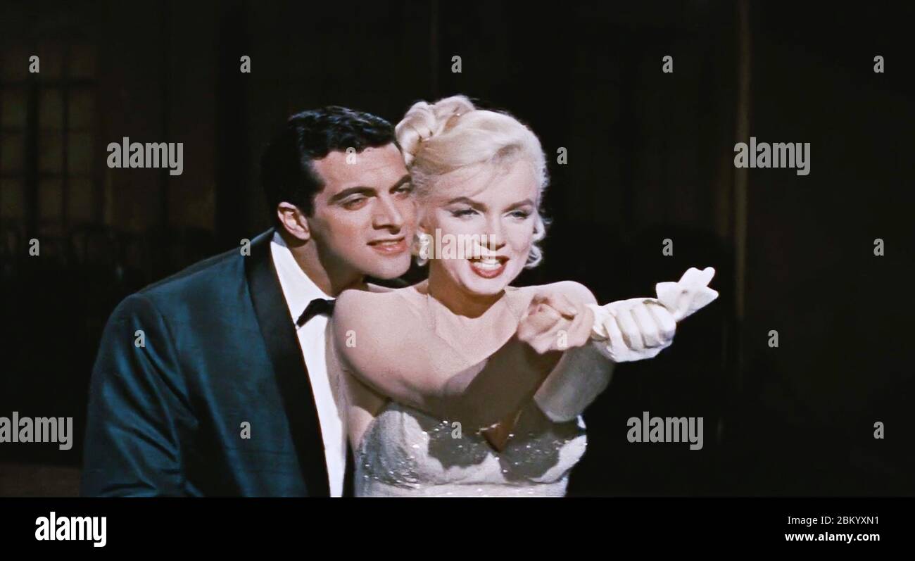 USA. Marilyn Monroe and Frankie Vaughan in a scene from the ©Twentieth ...
