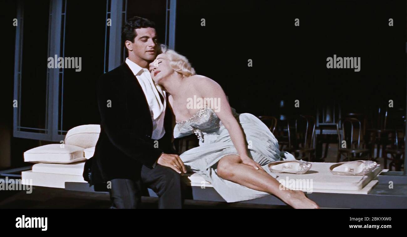 USA. Marilyn Monroe and Frankie Vaughan in a scene from the ©Twentieth ...