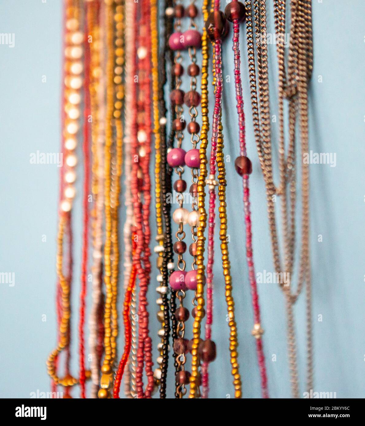 Gold string beads hi-res stock photography and images - Alamy