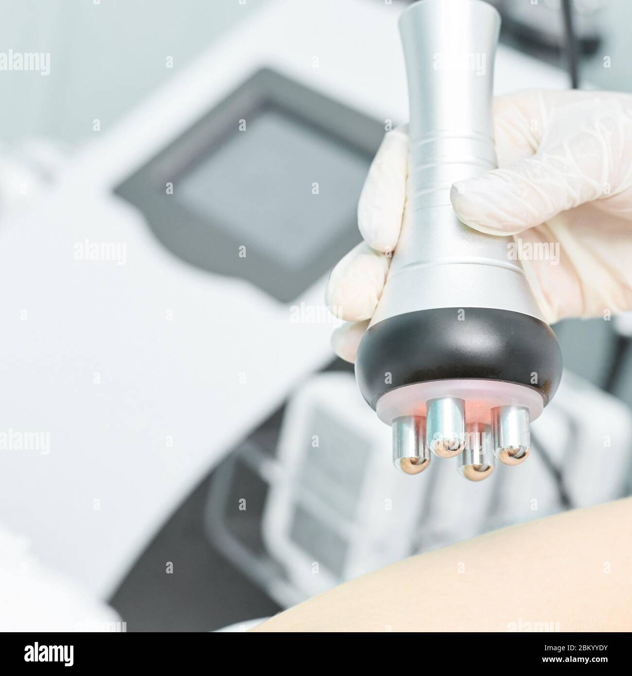 Perfect body radio treatment. Woman at spa procedure. Doctor hand and ...