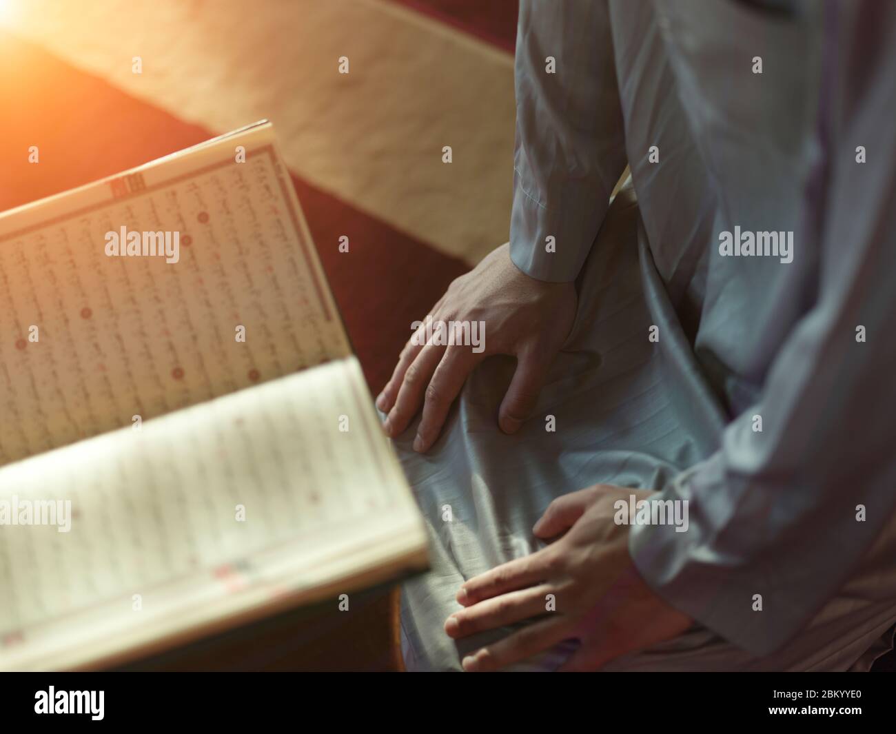 Muslim businessman reading holy islamic hi-res stock photography and ...