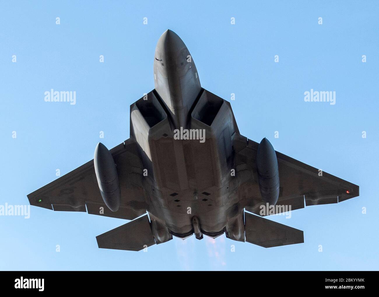 A U.S. Air Force F-22 Raptor flies over Joint Base Elmendorf-Richardson ...