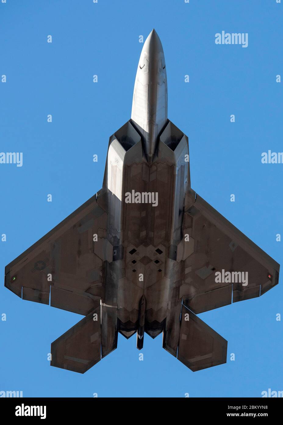 A U.S. Air Force F-22 Raptor flies over Joint Base Elmendorf-Richardson ...