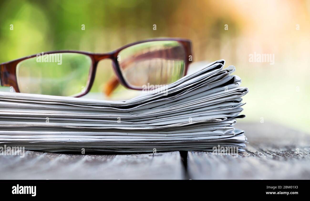 Morning news concept - newspaper and glasses with copy space Stock ...