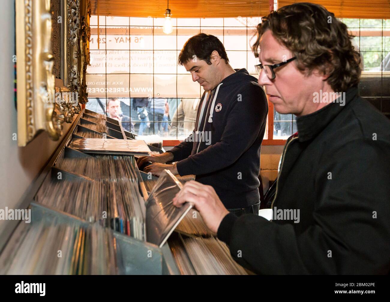 Djs looking through records hi-res stock photography and images - Alamy