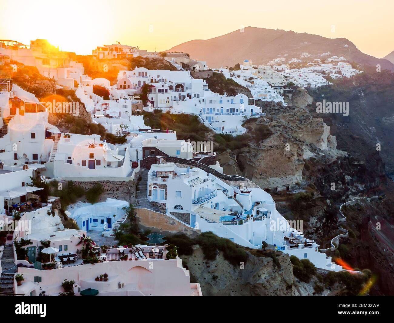 Amazing sunrise Santorini view with cave houses. Santorini island ...