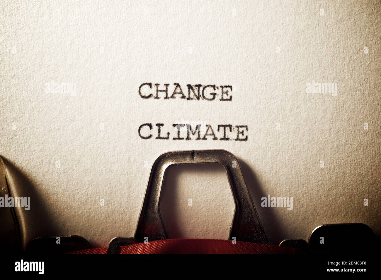 Change climate text written with a typewriter Stock Photo - Alamy