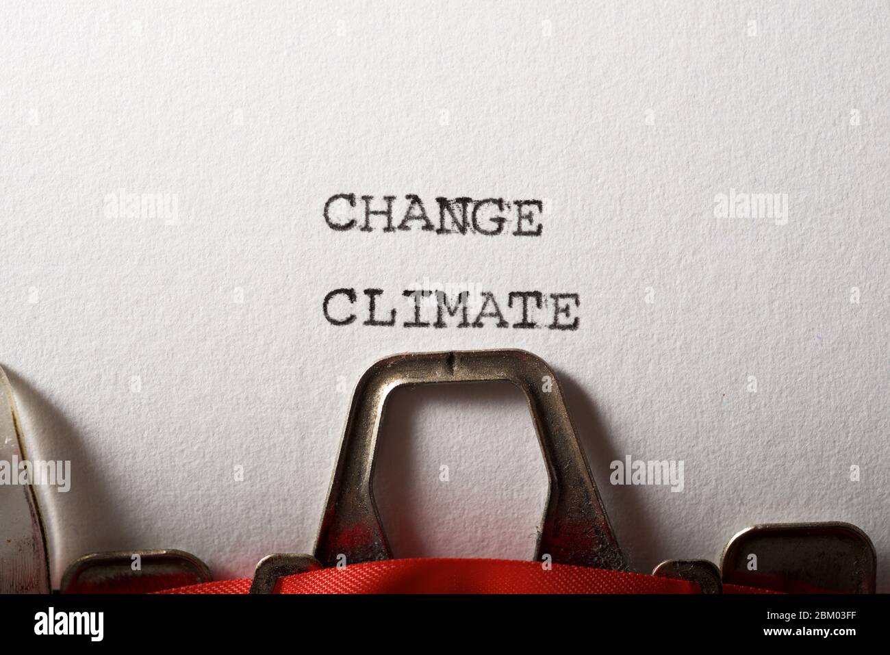 Change climate text written with a typewriter Stock Photo - Alamy