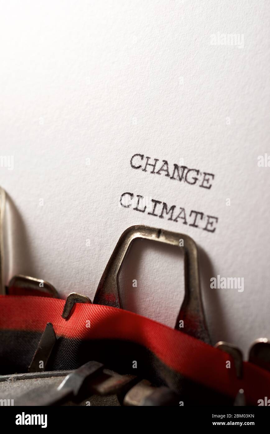 Change climate text written with a typewriter Stock Photo - Alamy