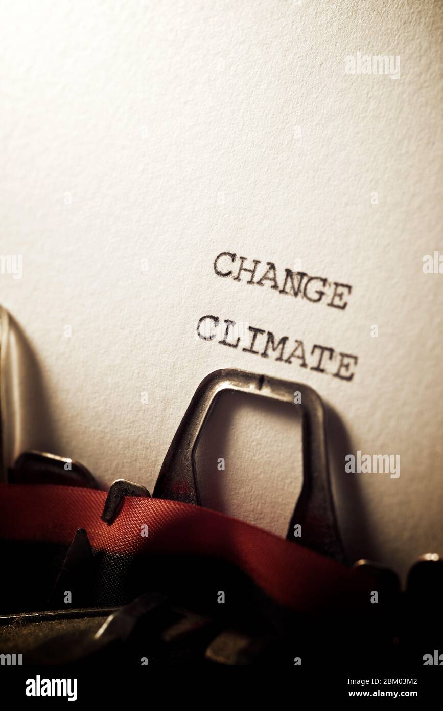 Change climate text written with a typewriter Stock Photo - Alamy