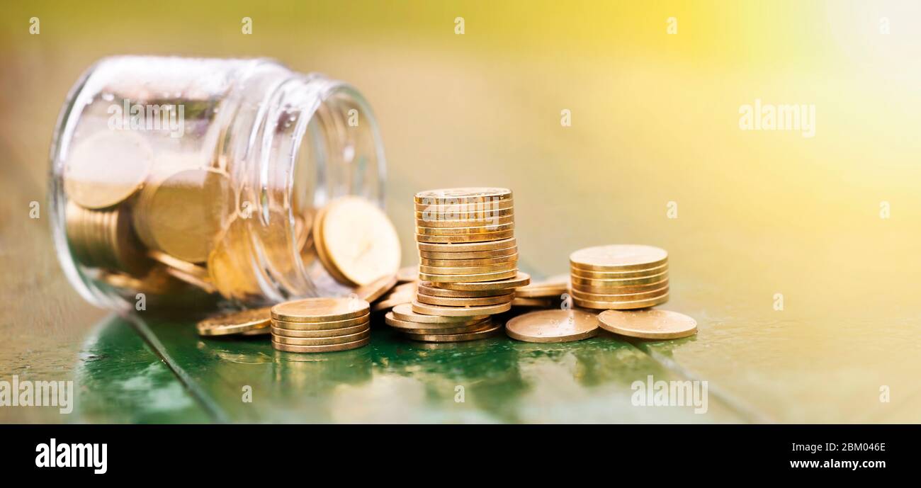 Web banner of gold coins with a jar glass - money savings, save concept ...