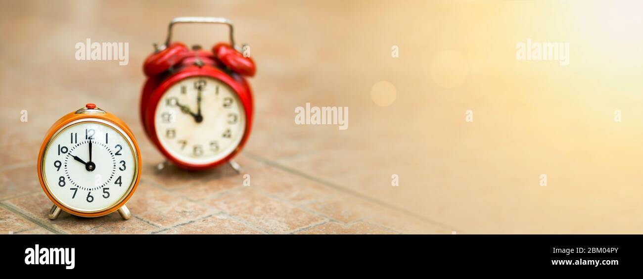 Time management concept - web banner of retro orange and red alarm ...