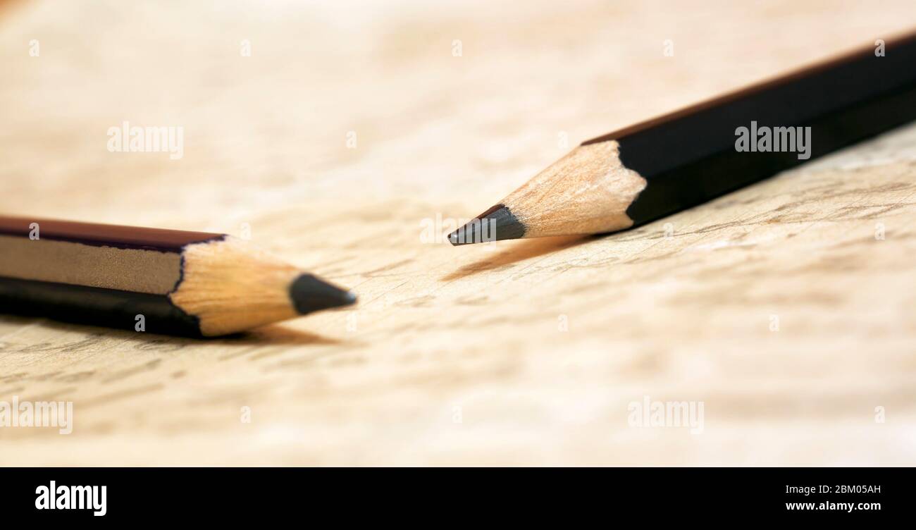Handwriting concept - web banner of pencils on old handwritten letter ...