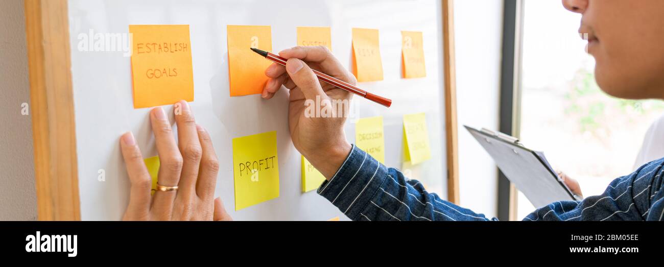 Woman focus on working post it notes hi-res stock photography and ...