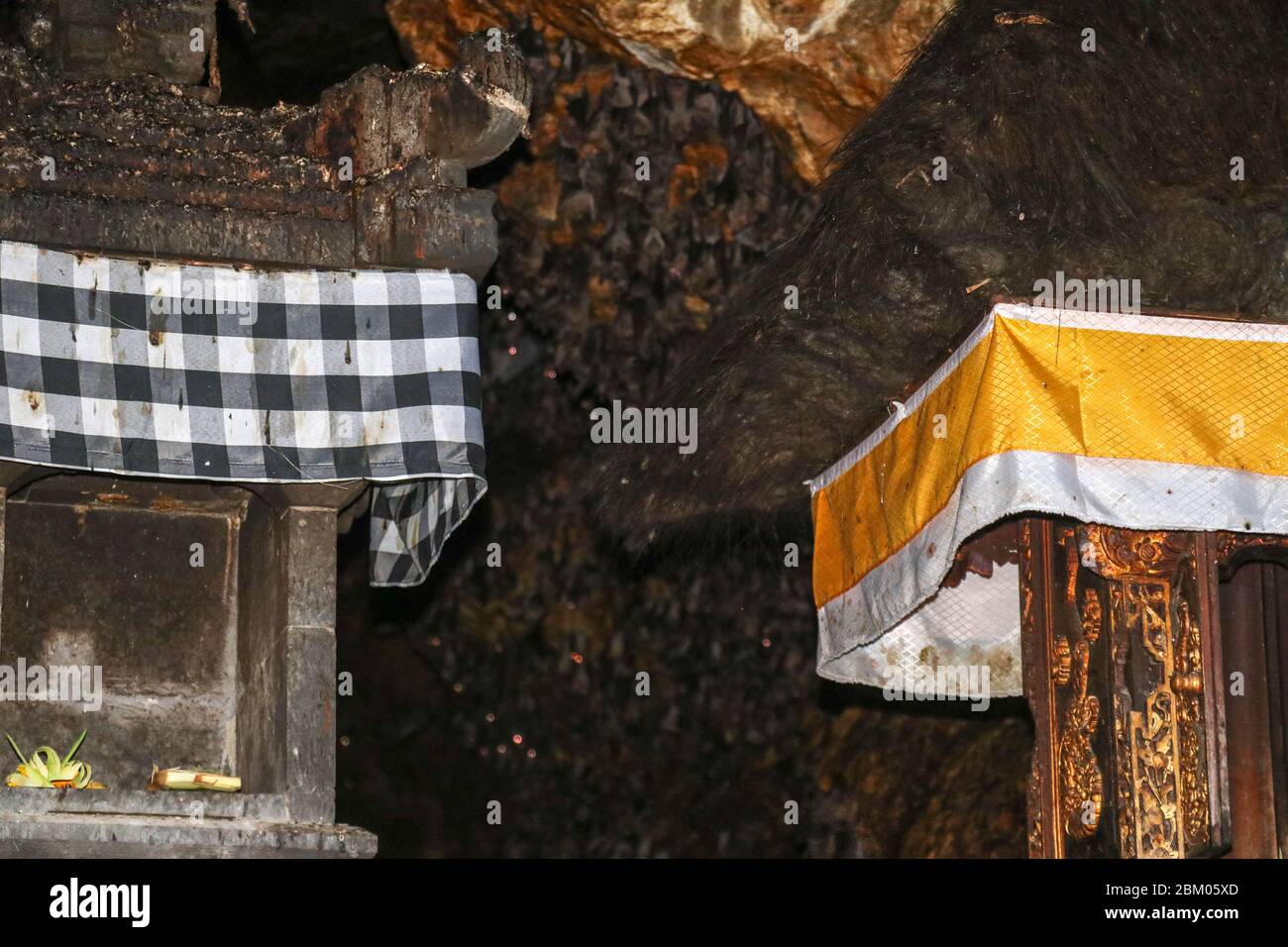 Altars at Pura Goa Lawah or Bat Cave Temple. Balinese Hindu temple ...
