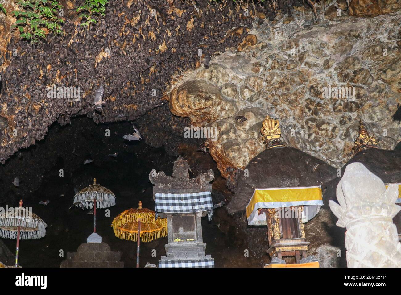 Altars at Pura Goa Lawah or Bat Cave Temple. Balinese Hindu temple ...