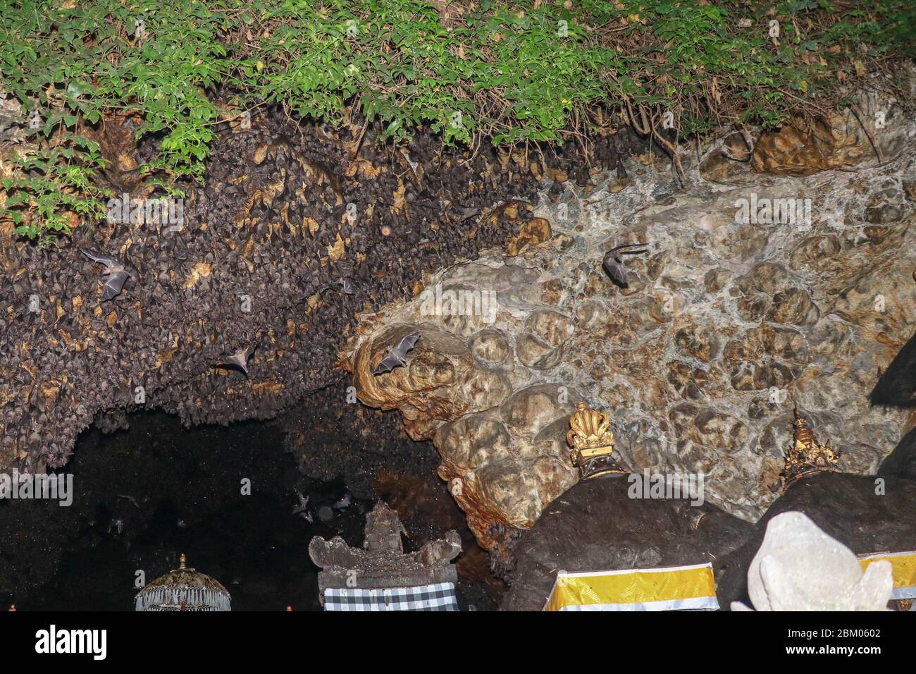 Altars at Pura Goa Lawah or Bat Cave Temple. Balinese Hindu temple ...