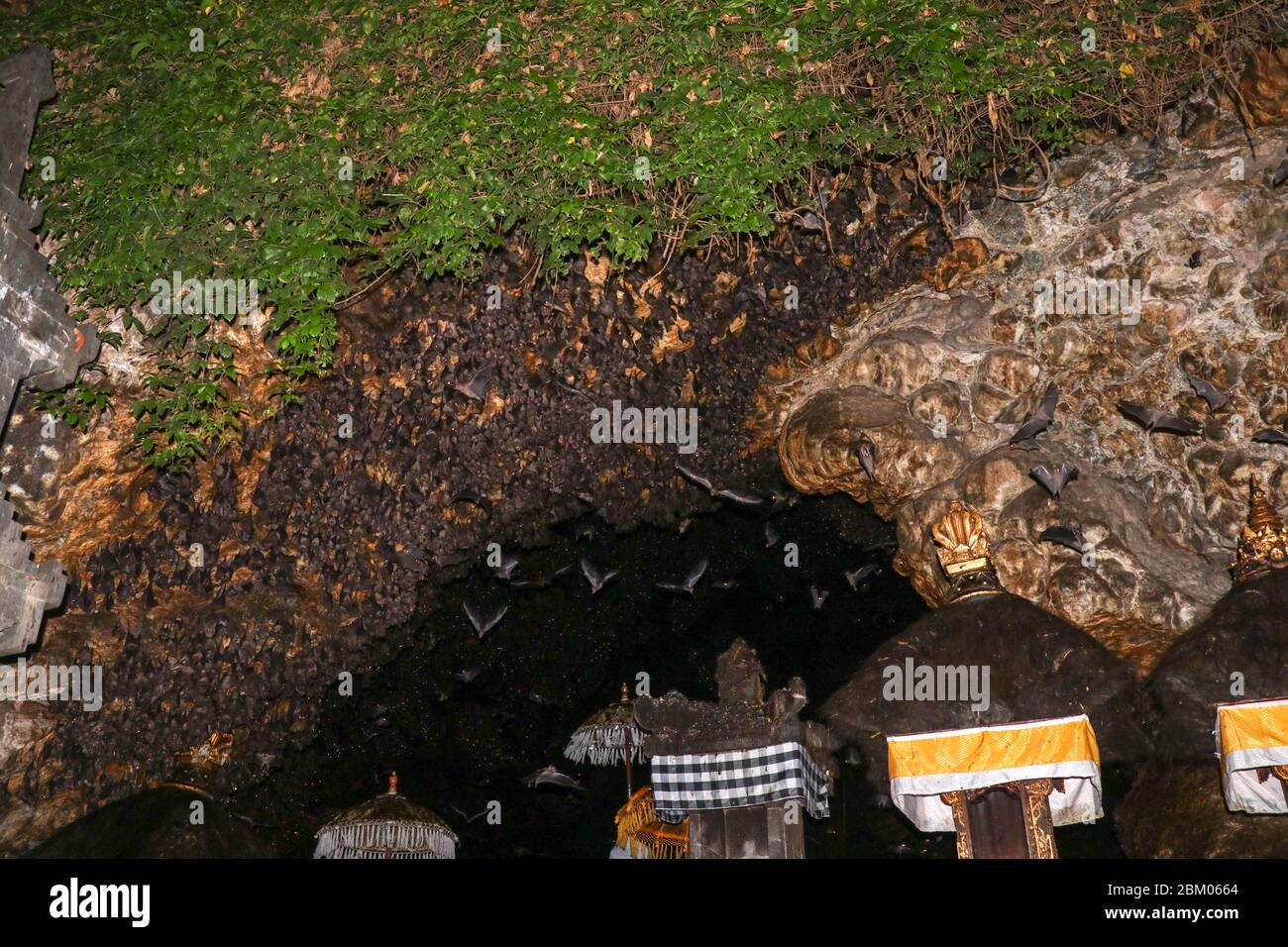 Altars at Pura Goa Lawah or Bat Cave Temple. Balinese Hindu temple ...