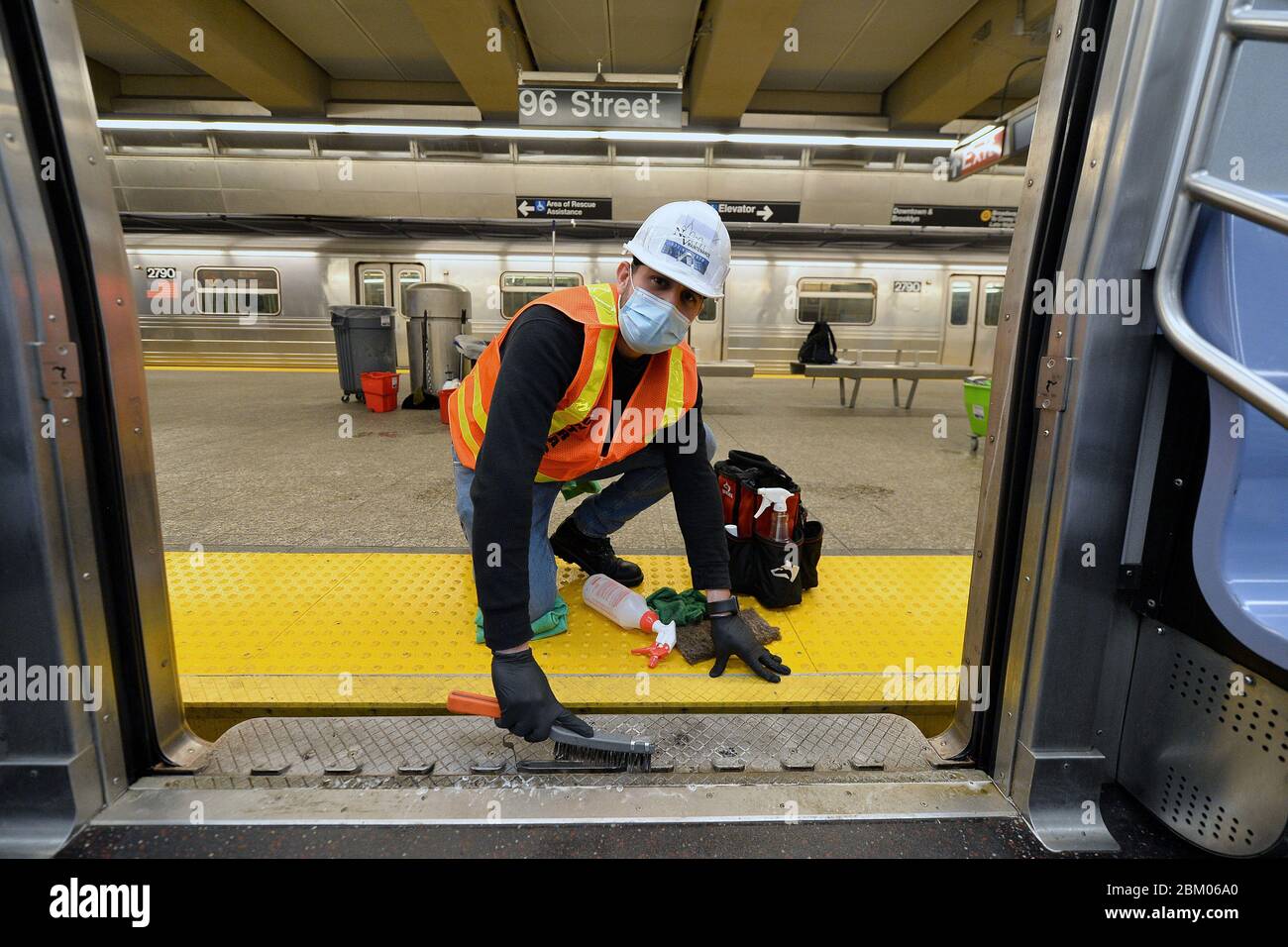 New York City, USA. 05th May, 2020. A contract cleaner for the MTA ...