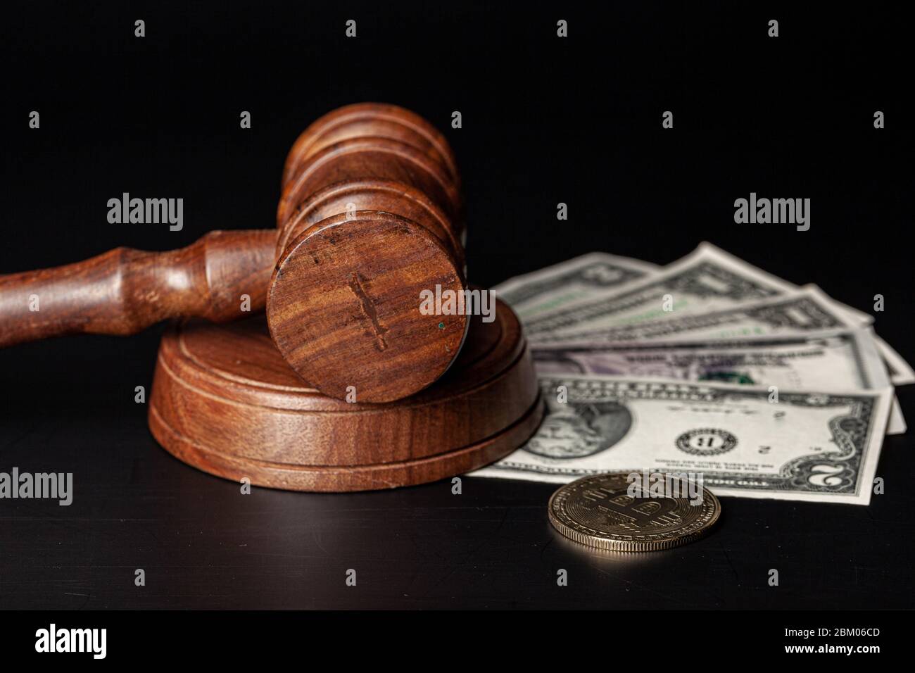 Law mallet and a stack of money Stock Photo - Alamy