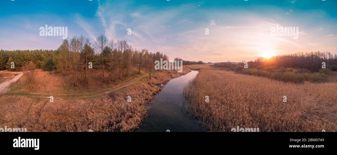 Spring rural landscape in the evening. Aerial view. Panoramic view of ...