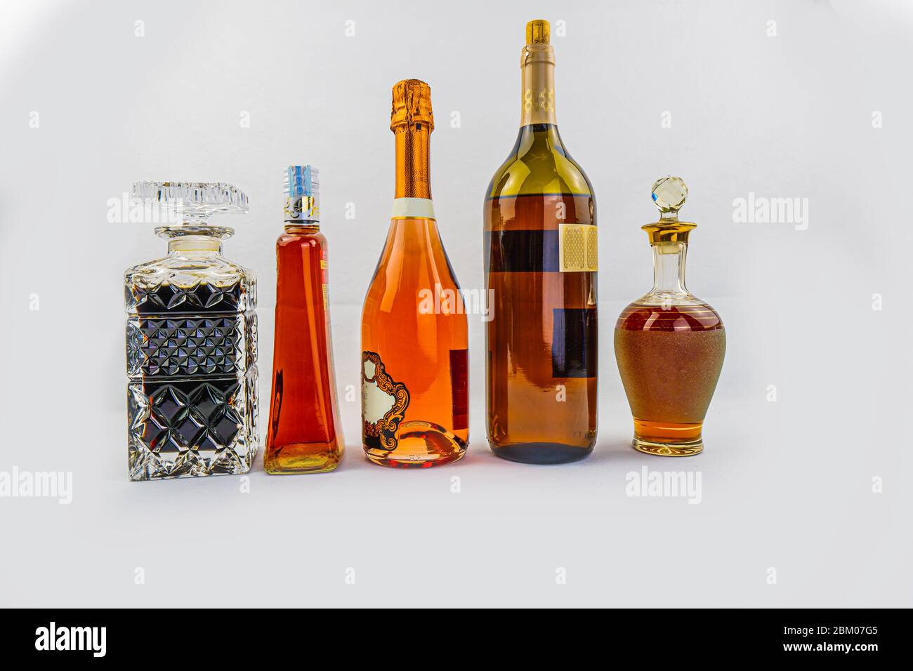 Still life with various glasses and bottles of alcohol Stock Photo - Alamy