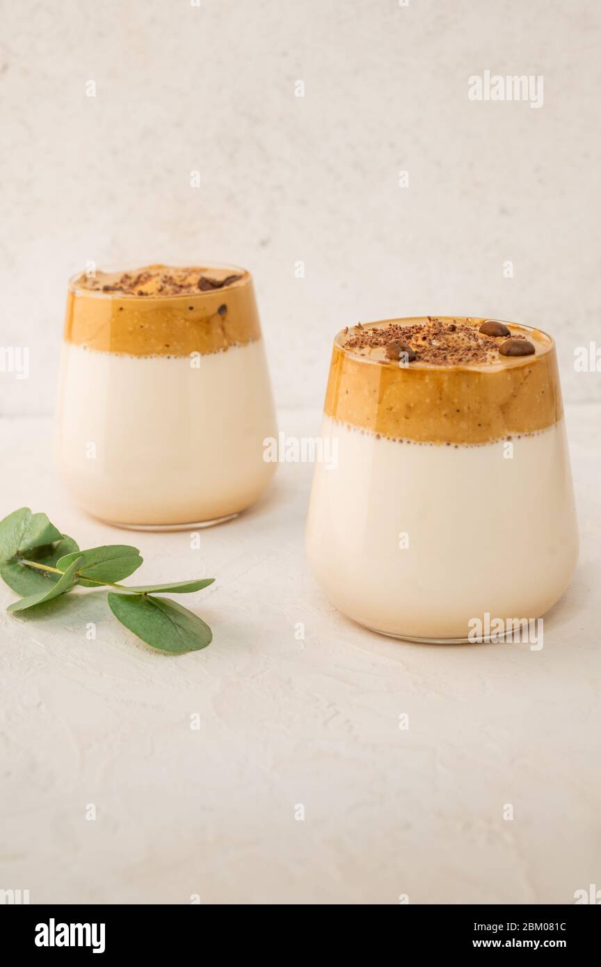 Homemade dalgona coffee. Trendy fluffy creamy whipped drink made by ...