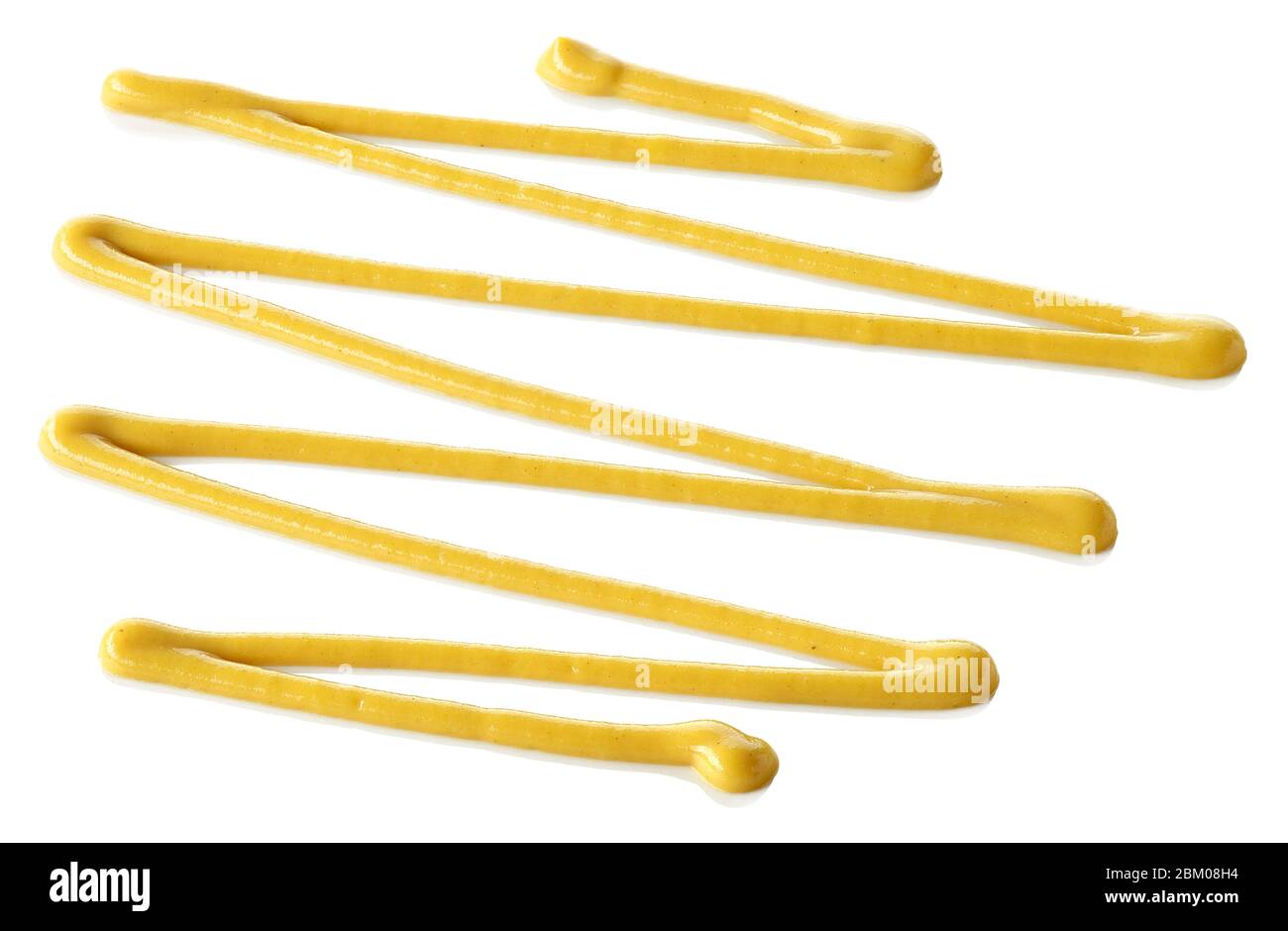 Splash of mustard on isolated white background Stock Photo - Alamy
