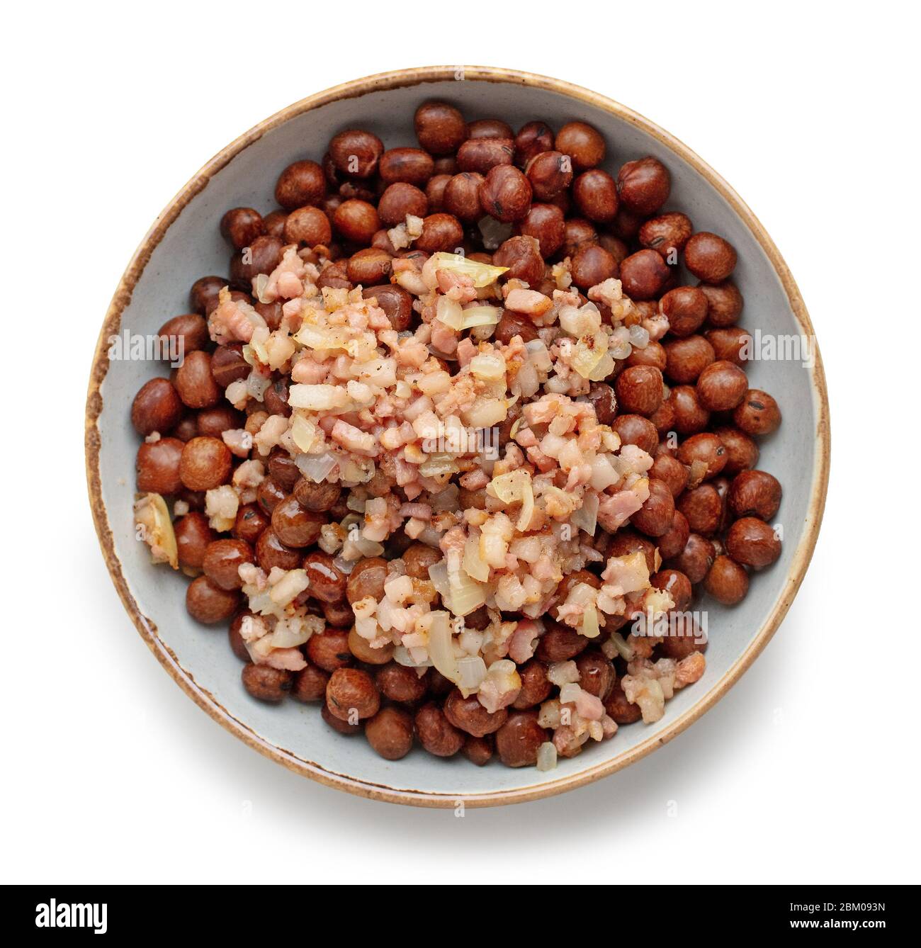 bowl of boiled gray peas with chopped bacon and onions isolated on ...