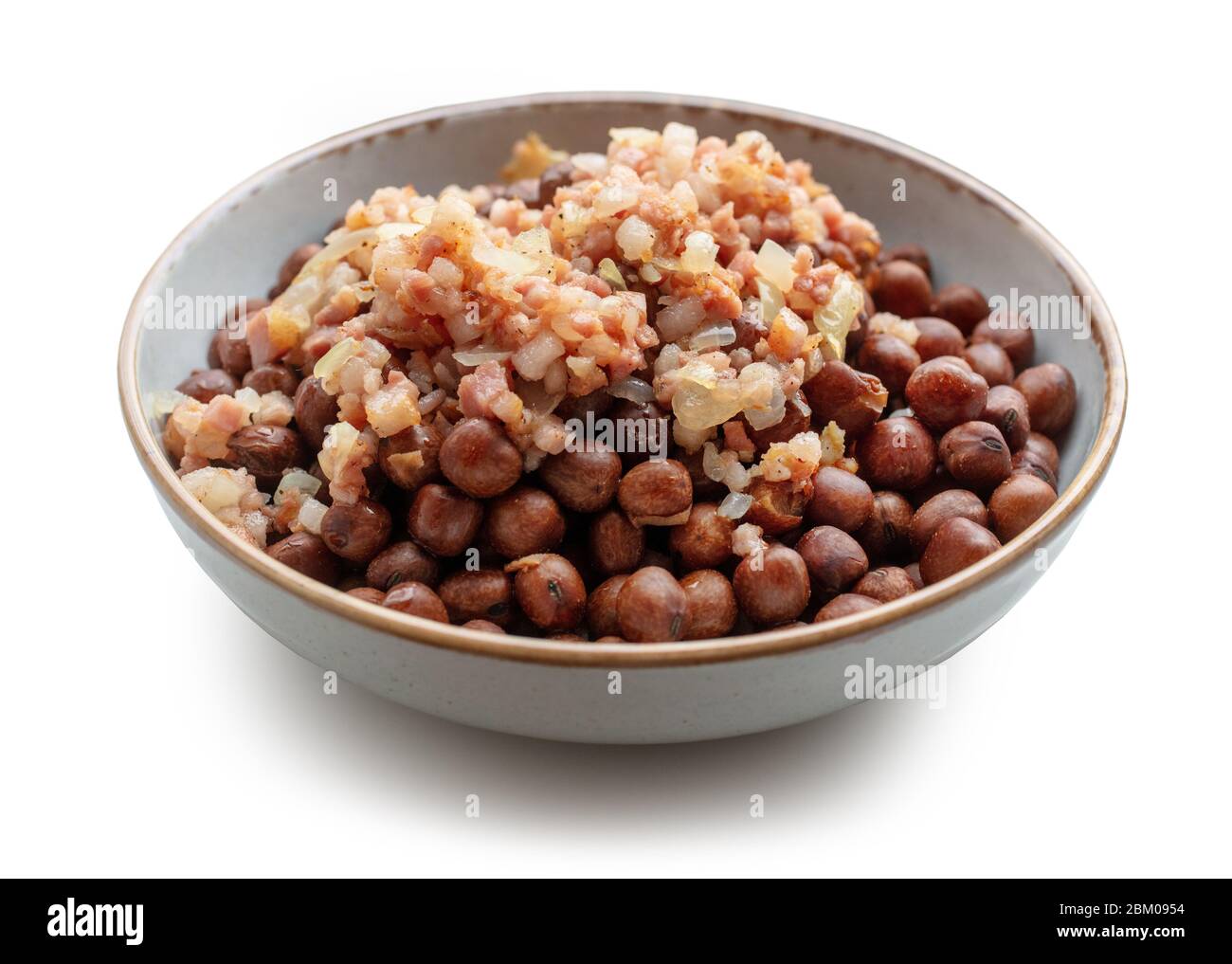 bowl of boiled gray peas with chopped bacon and onions isolated on ...