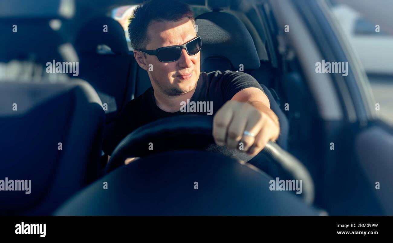 Driving pose hi-res stock photography and images - Alamy