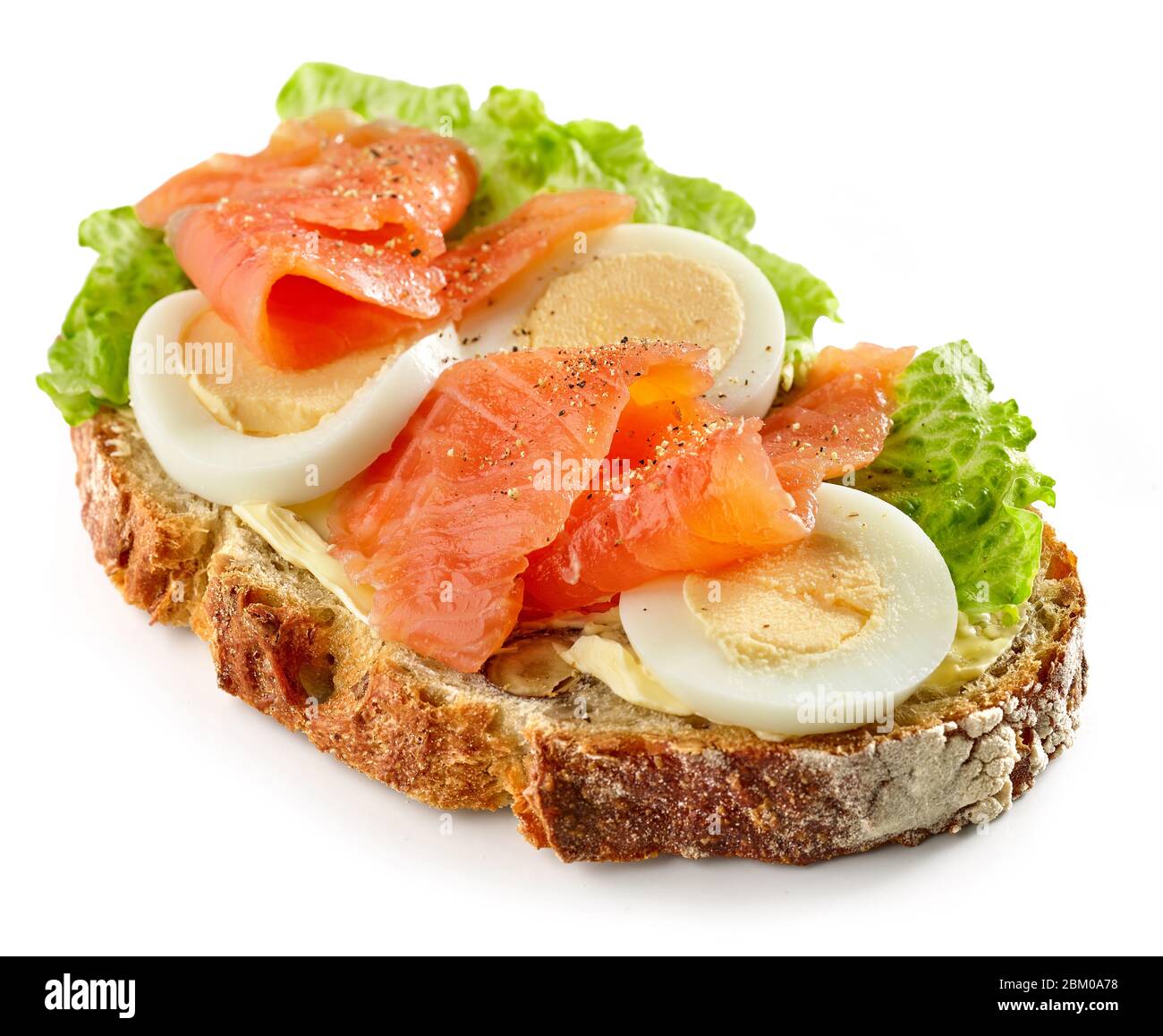 bread slice with boiled egg and salmon isolated on white background ...