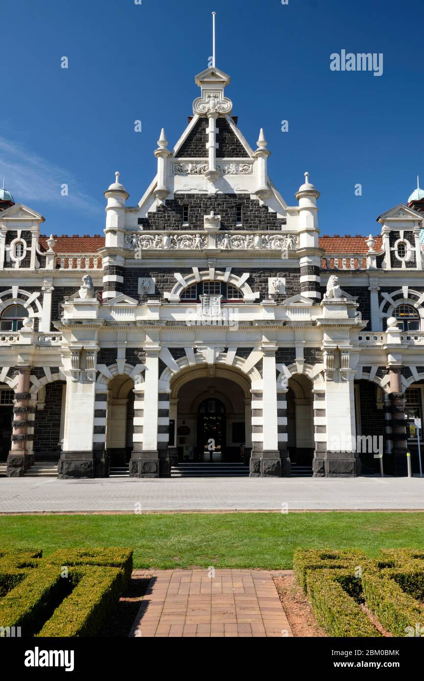 Gardens in front of Dunedin train station built in an eclectic Flemish ...