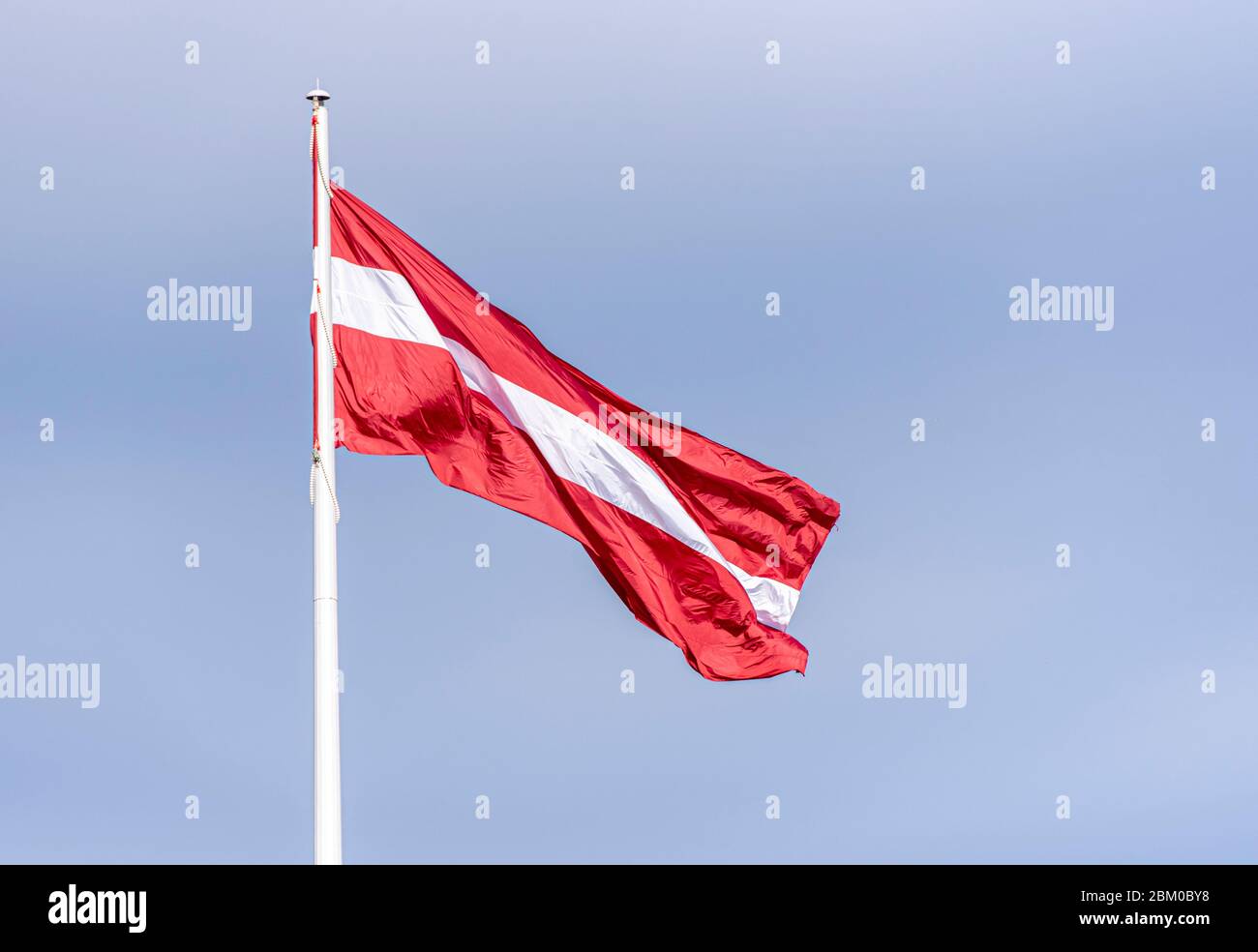 Flag wind mast waving hi-res stock photography and images - Alamy