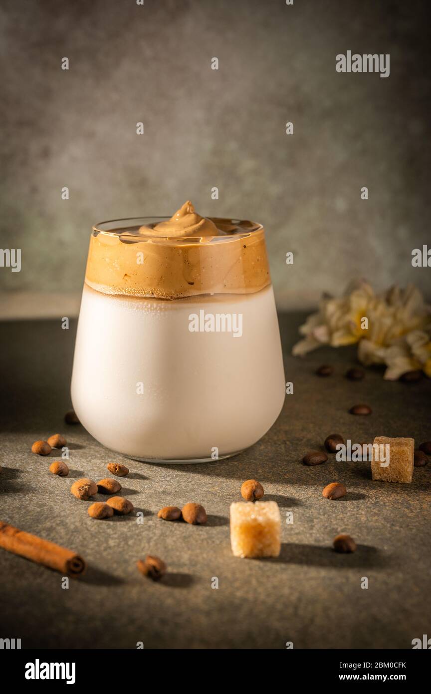 Homemade dalgona coffee. Trendy fluffy creamy whipped drink made by ...