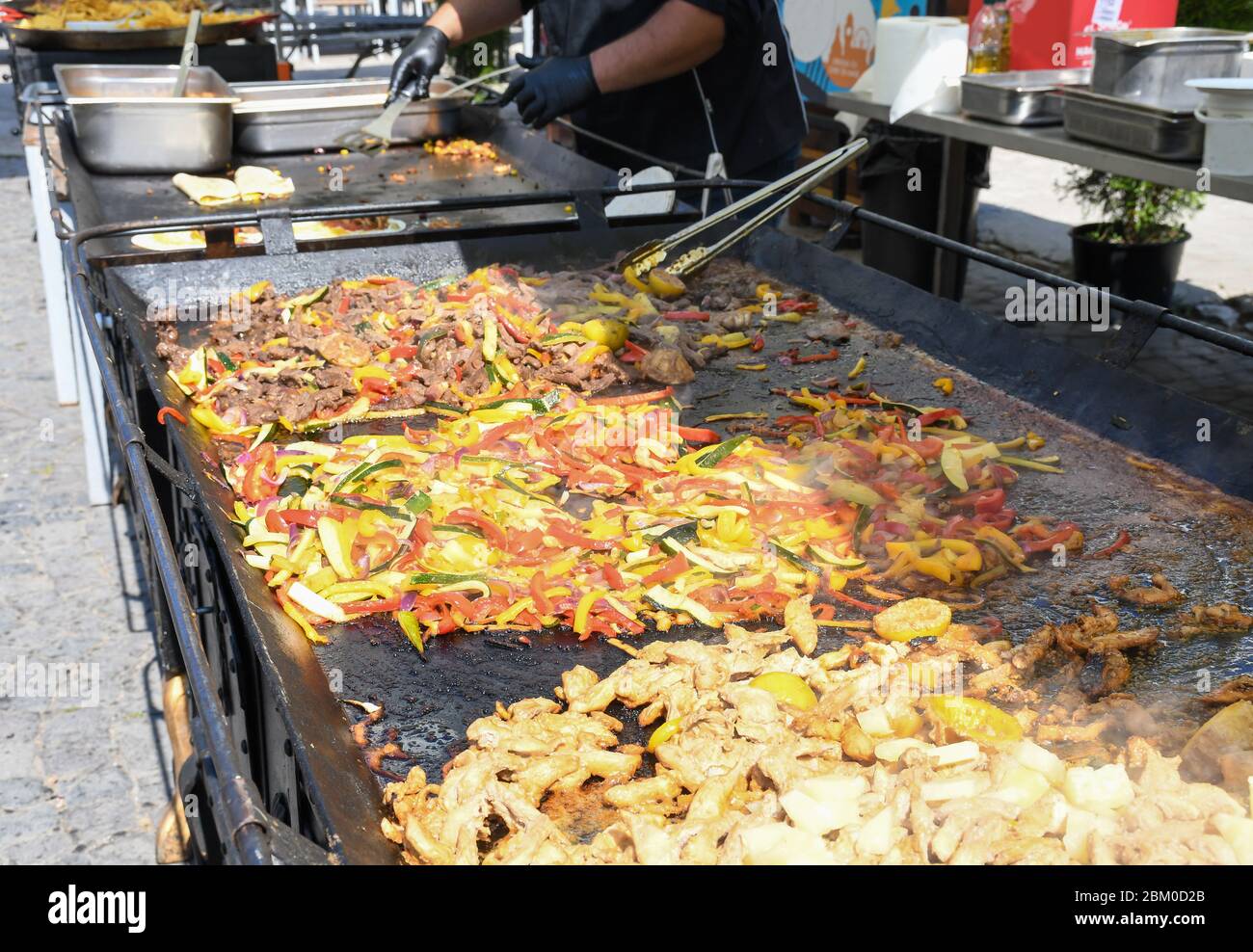 The process of preparing a quesadilla, traditional Mexican dish ...