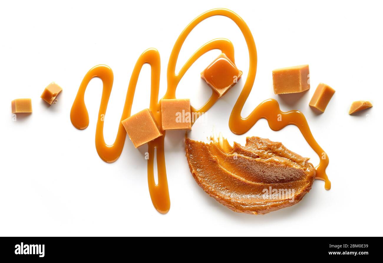 composition of caramel candies isolated on white background, top view ...