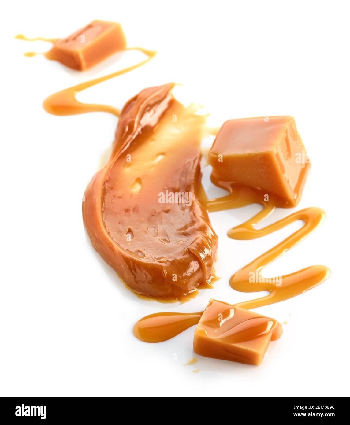 composition of caramel isolated on white background Stock Photo - Alamy