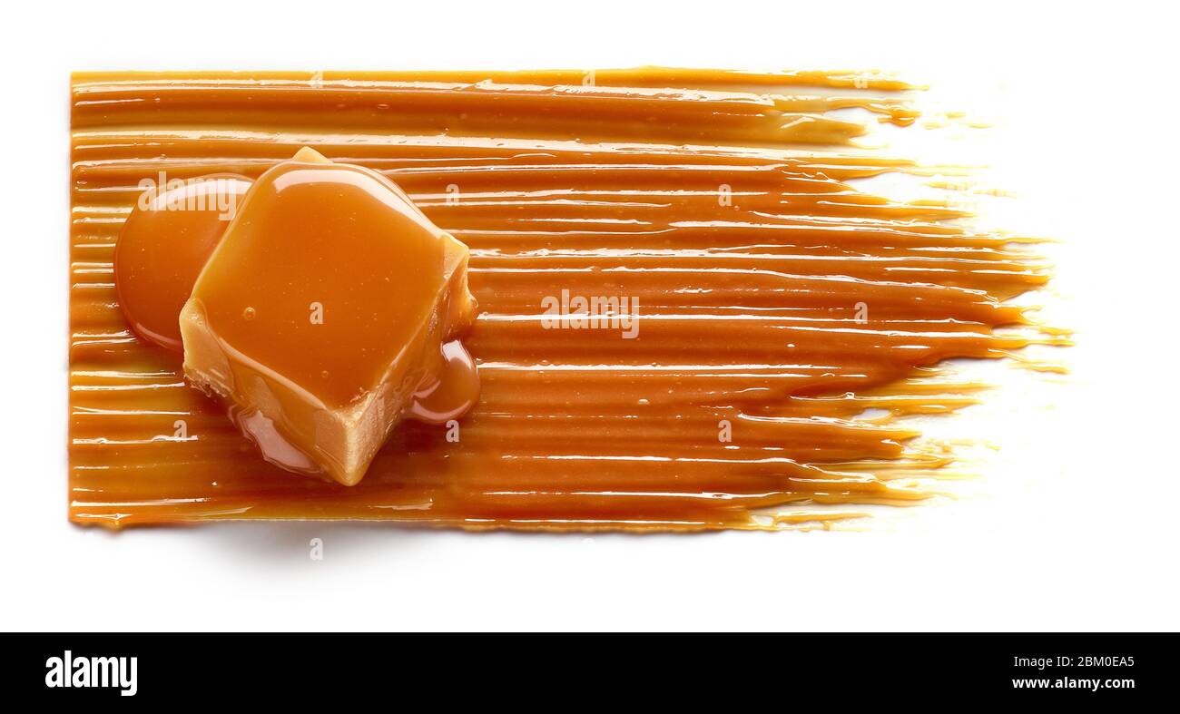 composition of caramel candies isolated on white background, top view ...
