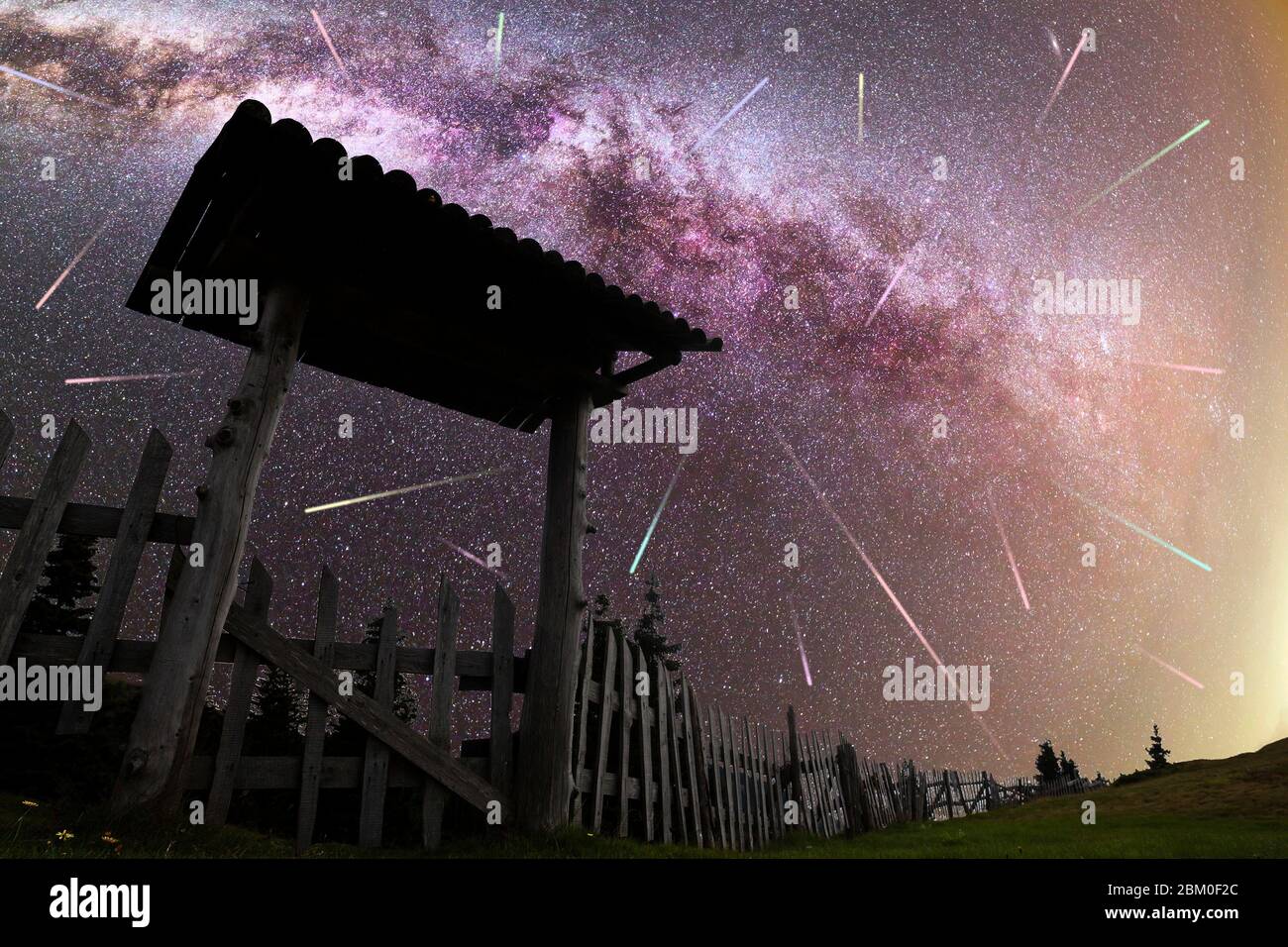 A view of a Meteor Shower and the purple Milky Way with wooden entrance ...