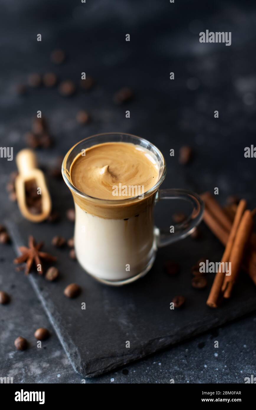 Two glass cups with Dalgona frothy coffee trend korean drink latte ...