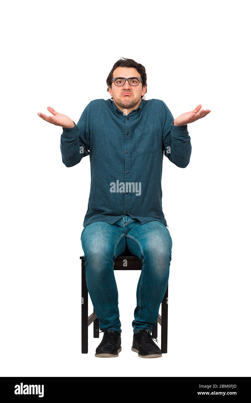 Sad man sitting on a chair hi-res stock photography and images - Alamy