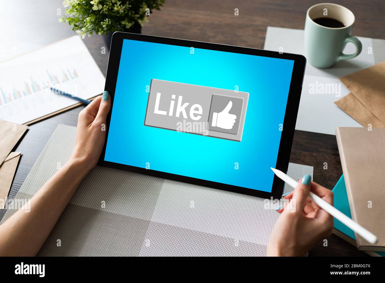 Like button on screen. SMM, Social media marketing concept Stock Photo ...