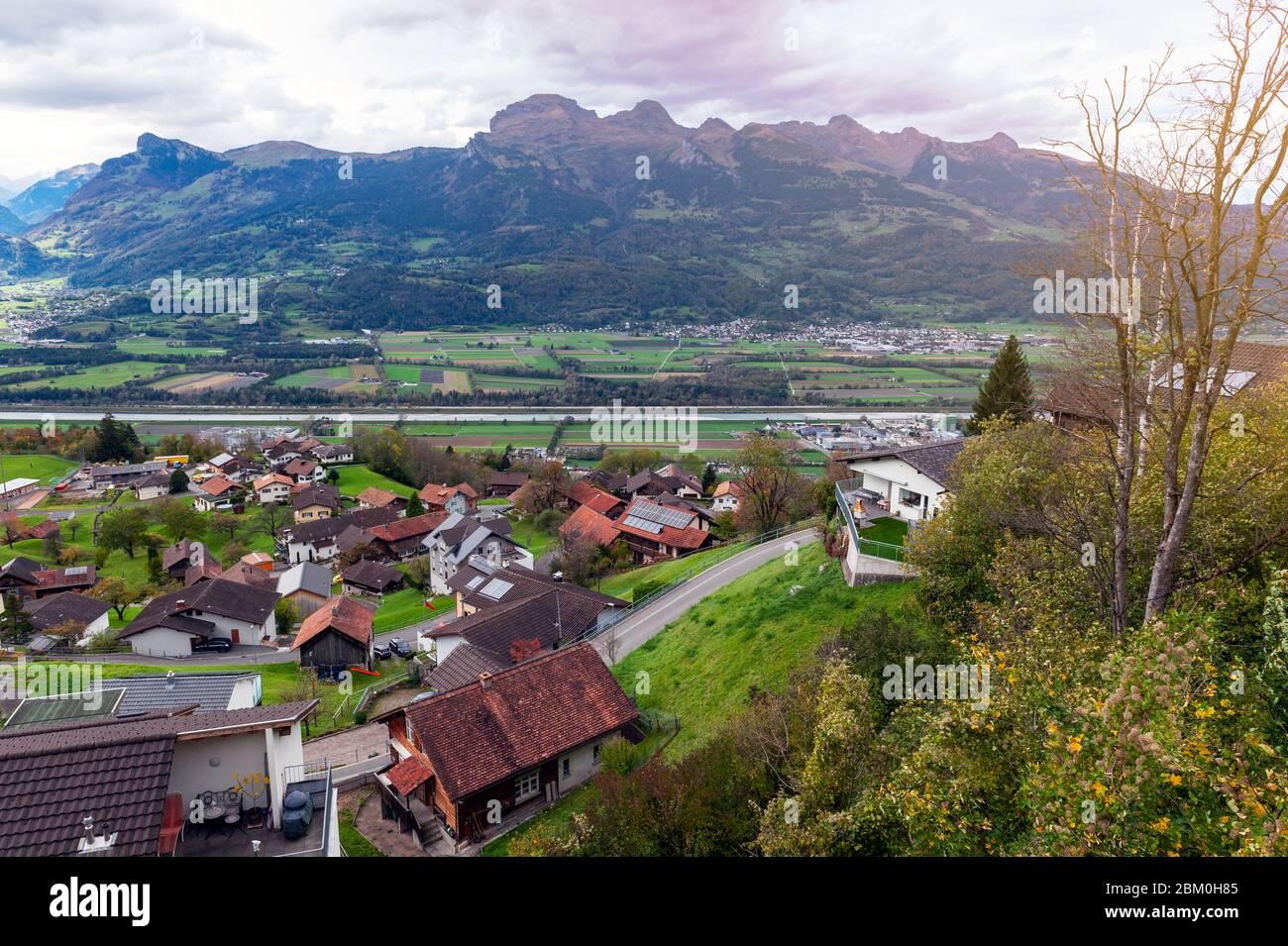 Scenic aerial view of hillside villages in Triesenberg and the river ...