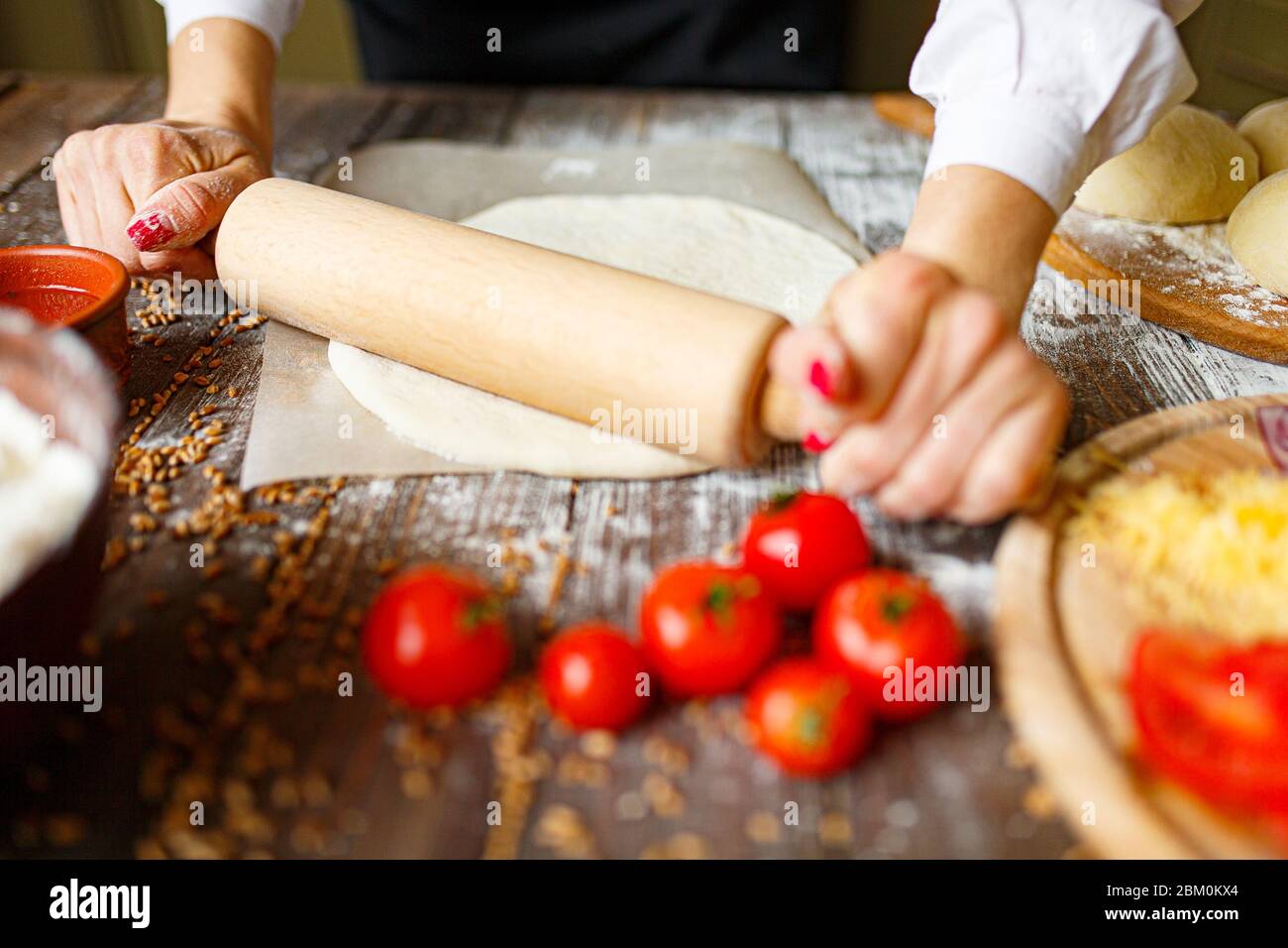 Womans hands roll dough woman hi-res stock photography and images - Alamy